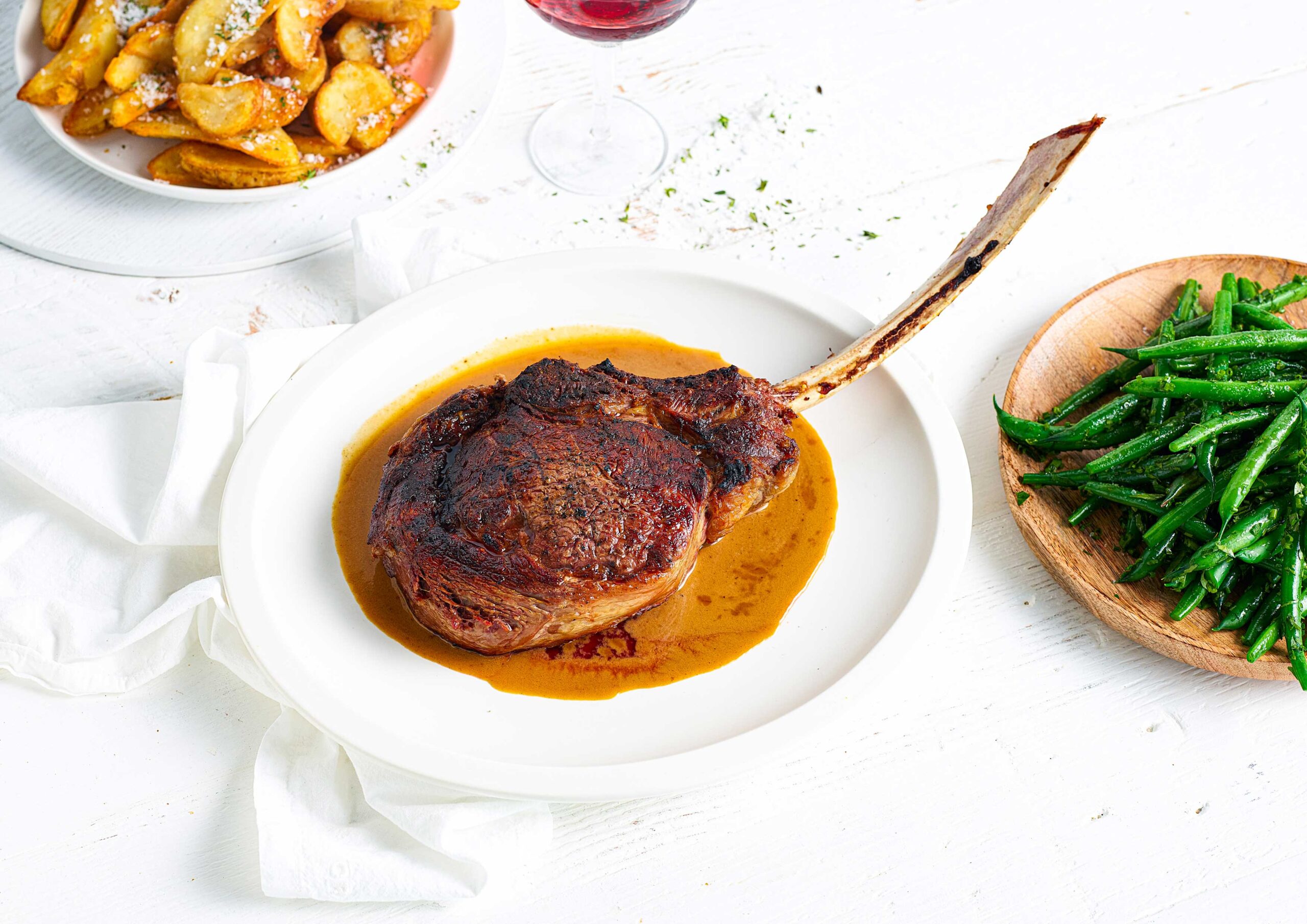 Nature’s Fresh tomahawk steak with rustic fries - Nature's Fresh